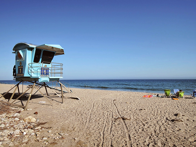 The lifeguard tower stands like a pastel sentinel on Gaviota's shores, a reassuring presence for ocean-goers and photographers alike.