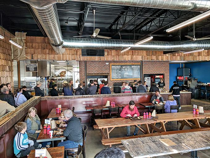 The lunch rush at Wayne's resembles a pilgrimage site for the carnivorous faithful. Worth every minute in line.