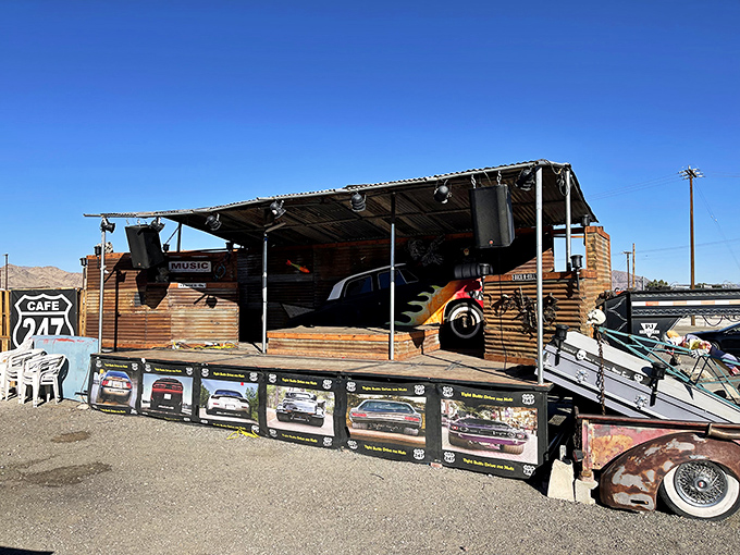 Desert entertainment central, where live music meets barbecue under endless blue skies. The stage where local legends and traveling troubadours share their sound.