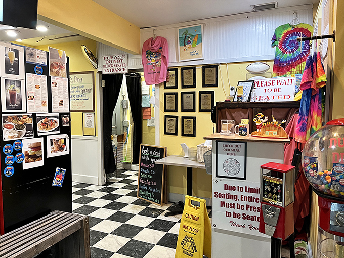 The entrance tells the story: awards on the wall, tie-dye shirts for sale, and a checkerboard floor that's seen generations of sandy flip-flops.