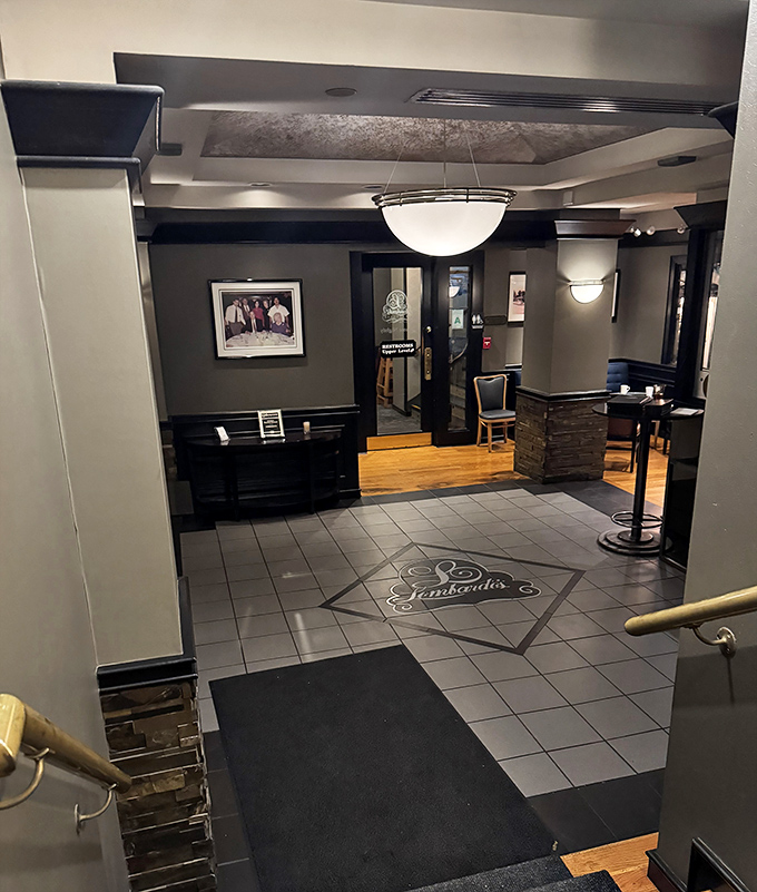 An entrance that transitions you from everyday life to Italian escape, with that floor medallion practically whispering "benvenuto" as you arrive.