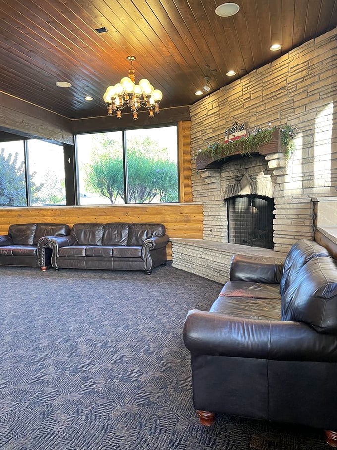The waiting area's stone fireplace and leather couches say, "Relax, the steak is worth whatever time it takes."