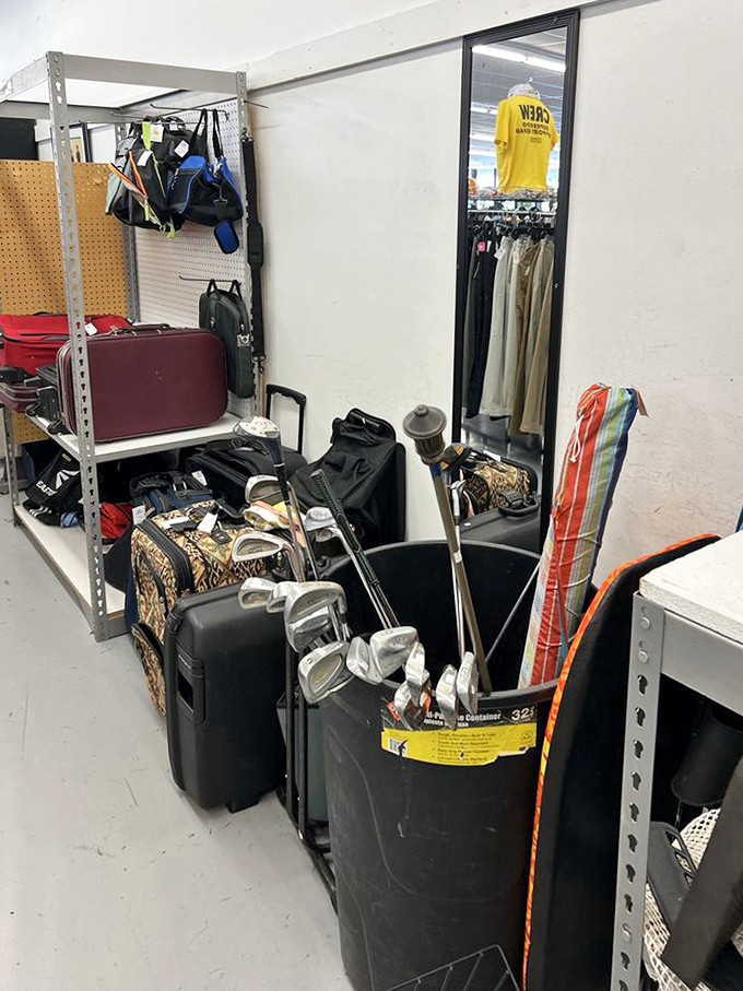 The sports equipment corner: where golf clubs, luggage, and beach gear patiently wait for their next adventure with new owners.
