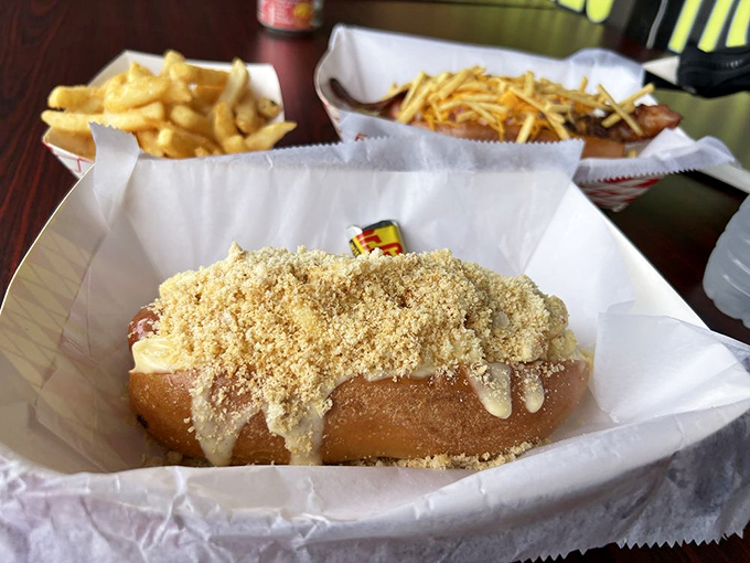 The Mac Dog proves that sometimes more is more&mdash;especially when "more" means mac and cheese atop an already perfect hot dog.