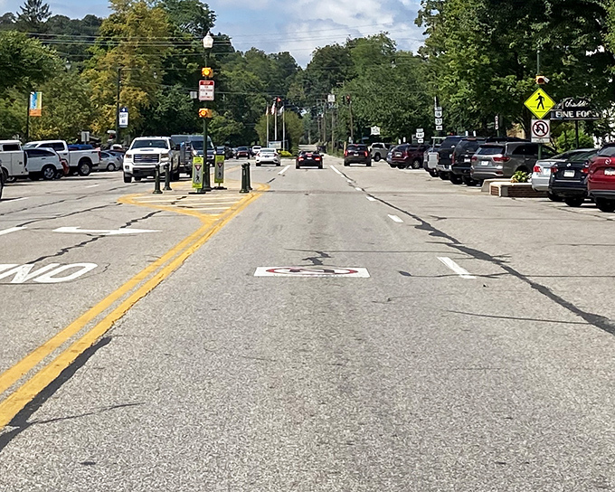 Granville's main drag &ndash; where two yellow lines divide traffic but the community spirit refuses to be separated by anything so trivial.