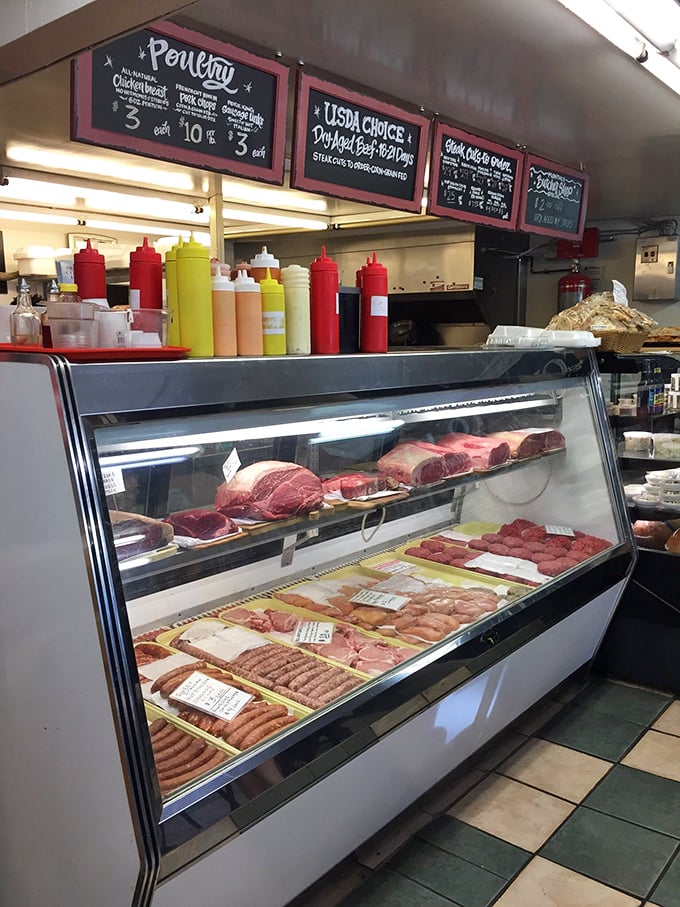 The meat case&mdash;a gallery where protein is the art. Each cut displayed with the reverence it deserves, awaiting its transformation.