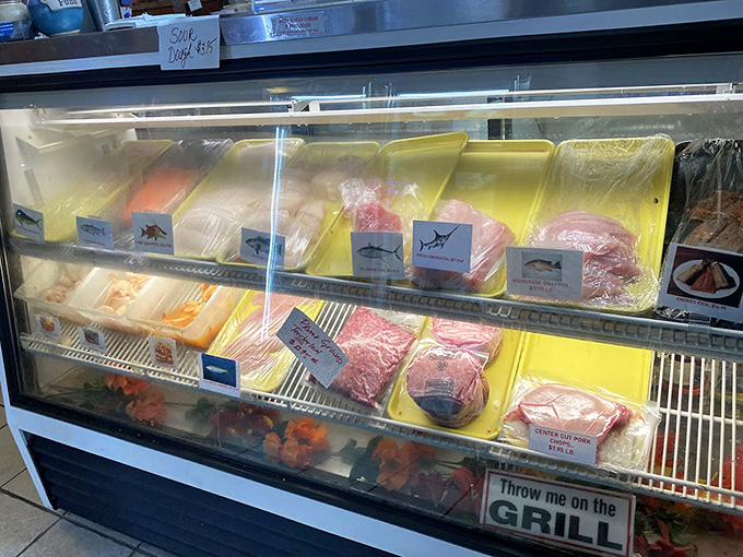 The market case displays today's fresh catches, letting you pick your own adventure or grab something to cook at home.
