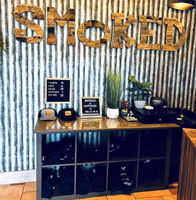 Even the merchandise corner embraces the rustic-industrial vibe &ndash; because nothing says "I've found barbecue nirvana" like a branded t-shirt.