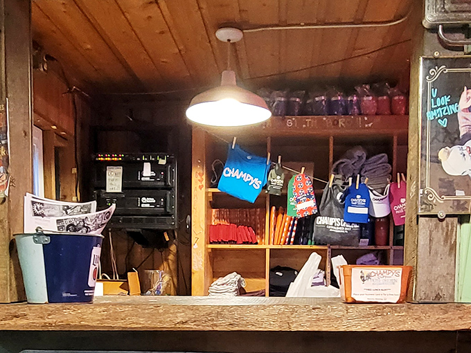 Behind the counter, merchandise waits for those who want to take a piece of Champy's magic home with them.