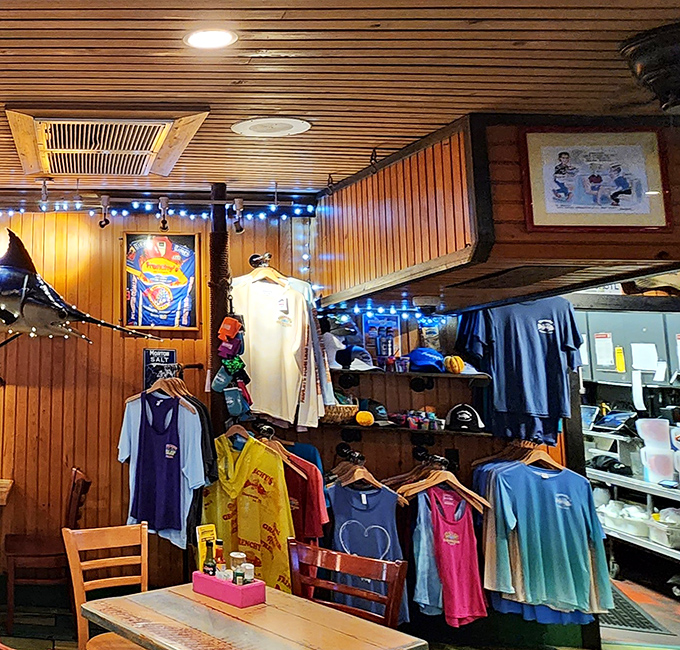 Even the merchandise corner maintains that laid-back beach vibe, offering souvenirs that say "I found the real Florida" not "I went to a gift shop."
