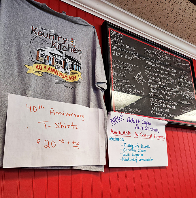 The 40th anniversary t-shirt hangs beside a menu board listing adult beverages with playful names that would make even a teetotaler smile.
