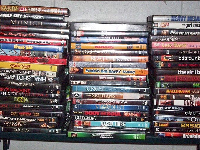 DVD stacks that tell the story of movie nights past. From "Spartans" to "Care Bears," this collection spans every conceivable genre.