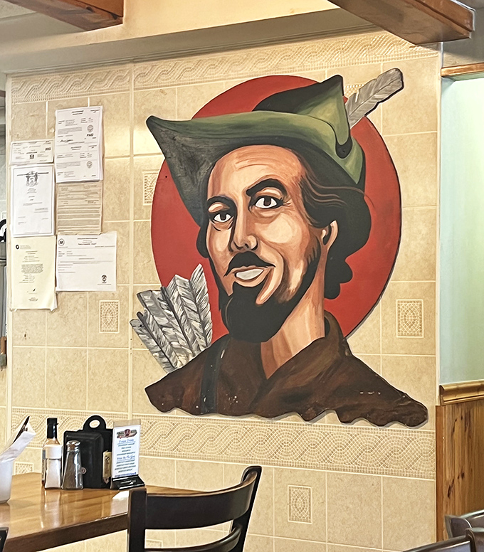 The Robin Hood mural watches over diners like a benevolent breakfast guardian, ensuring everyone leaves with full bellies and light wallets.