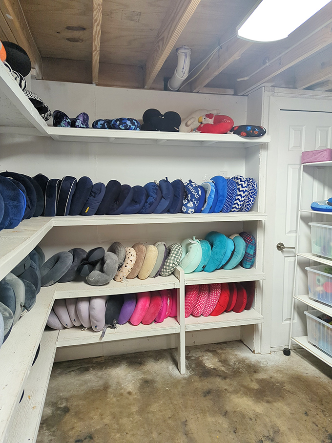 A pillow paradise organized by color &ndash; like a designer's mood board for the world's most comfortable nap laboratory.