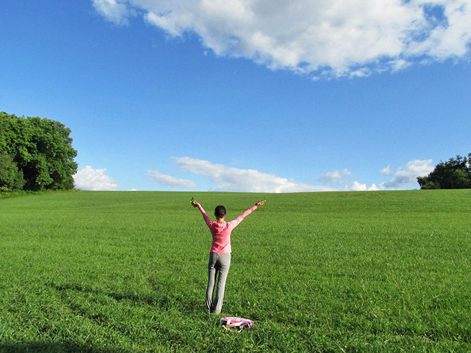 Arms outstretched to embrace the sky, this is freedom in its purest form. Some therapy sessions happen on couches; the best ones happen here.