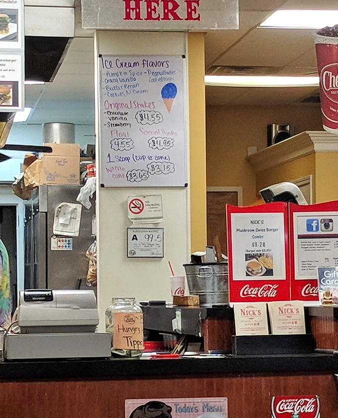 The order counter&mdash;where burger dreams come true and friendly staff turn your cravings into reality with minimal fuss.