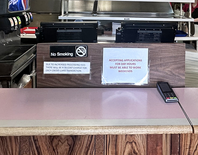 The order counter where magic begins, complete with awards recognizing what locals have known for decades.