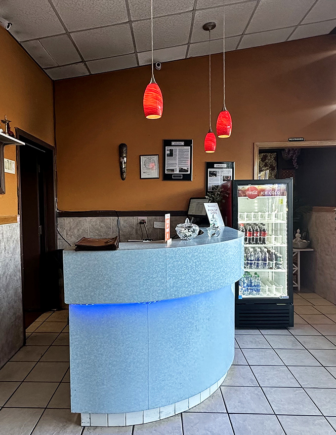 The reception counter glows blue like a portal to another world, which in a way, it is&mdash;a gateway to flavors from across continents.
