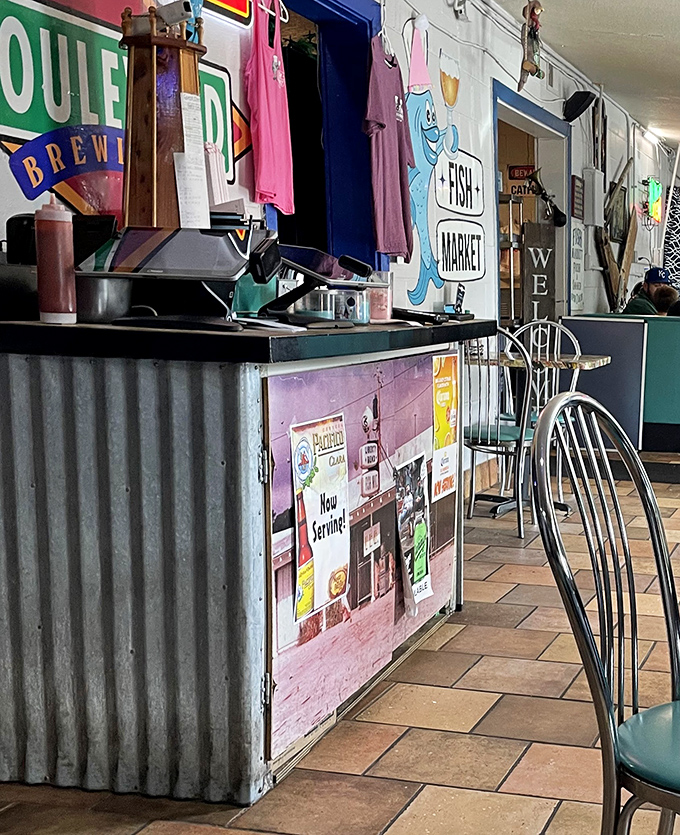 The order counter, where dreams become reality. That corrugated metal front adds just the right touch of coastal fish shack authenticity.
