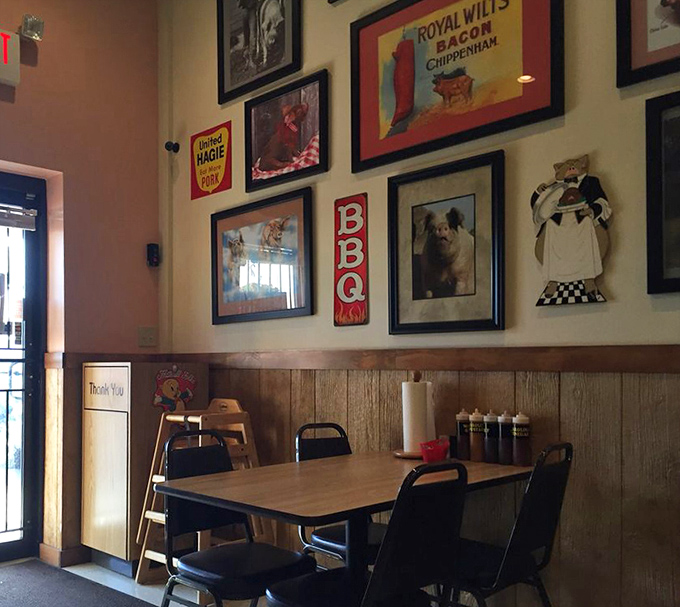 BBQ shrine meets classroom cafeteria in the best possible way. Those framed pig pictures aren't just decor—they're inspiration.