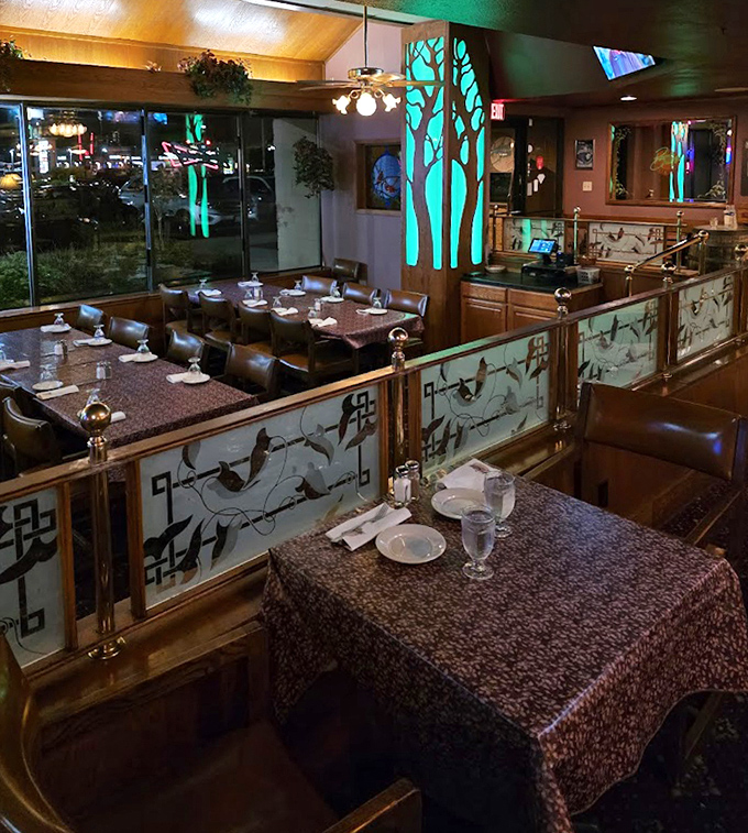 Dining sections separated by etched glass dividers create intimate spaces for both romantic dinners and "I can't believe we're finally out of the house" family meals.