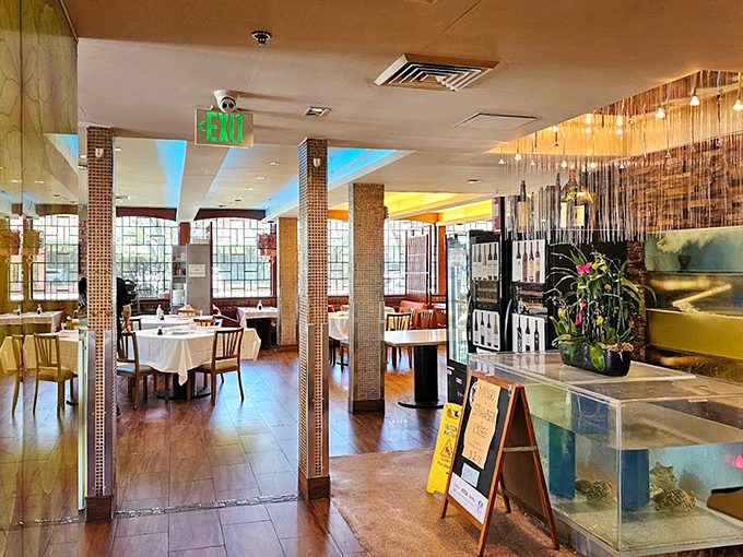 The modern interior balances elegance with accessibility&mdash;warm lighting and wooden accents creating the perfect backdrop for the food drama about to unfold on your table.