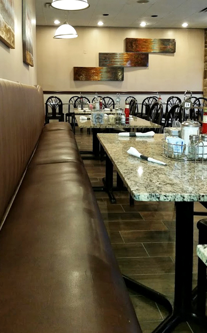 Booth seating that invites you to slide in, settle down, and stay awhile&mdash;the natural habitat of coffee refills and lingering conversations.