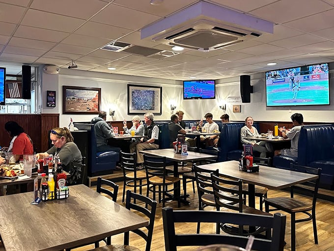 Blue booths and wooden chairs create cozy dining zones where conversations flow as freely as the beverages in this Gettysburg gathering spot.