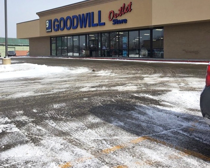 Even in winter, bargain hunters brave the elements. The snow-dusted parking lot is just another obstacle between dedicated shoppers and potential treasures.