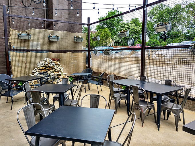 The patio offers al fresco dining with industrial charm—because sometimes great food tastes even better under string lights.