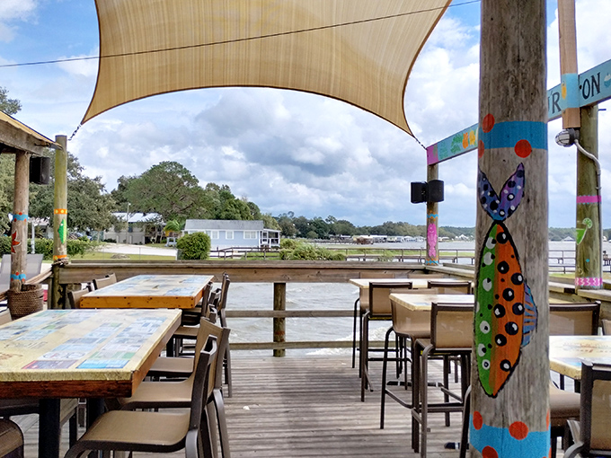 Outdoor seating with a view that Instagram filters wish they could improve. Lake breezes included at no extra charge.