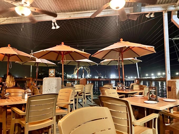 Dining under the stars with harbor lights twinkling in the distance. Even the umbrellas seem to be saying, "Stay awhile, will ya?"