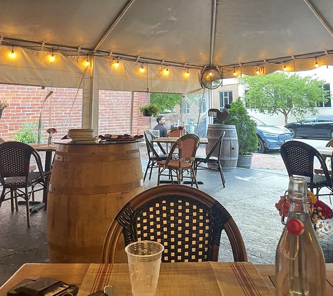 Outdoor seating under twinkling lights – because everything tastes better when you're dining al fresco in perfect weather.