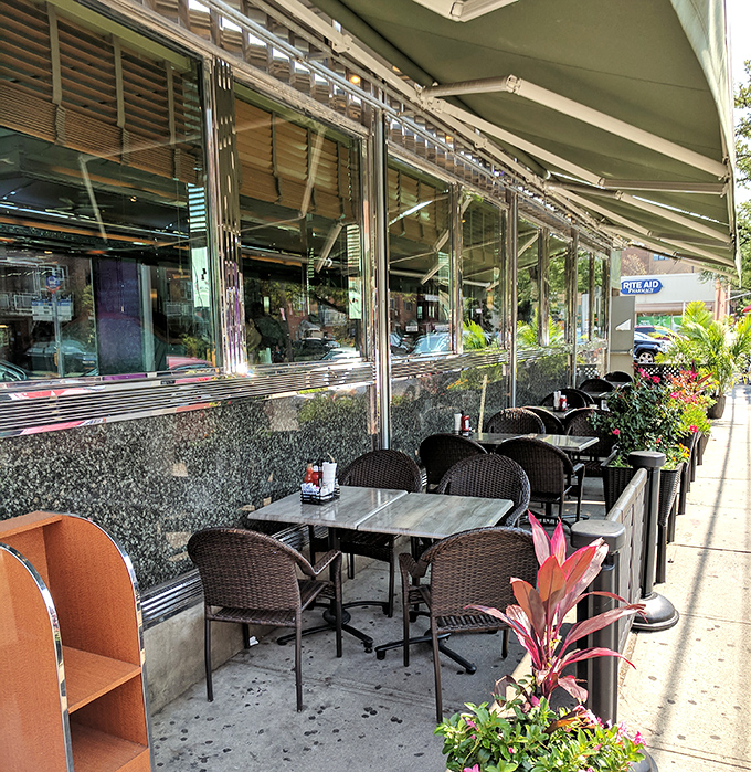 Outdoor seating at Bel Aire offers prime Astoria people-watching with your meal. Urban dining with a side of neighborhood theater.