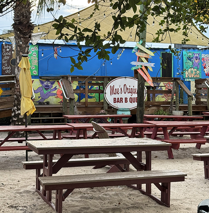 The outdoor dining area feels like a backyard BBQ where everyone's invited. Those picnic tables have witnessed more food-induced happiness than a birthday cake. 