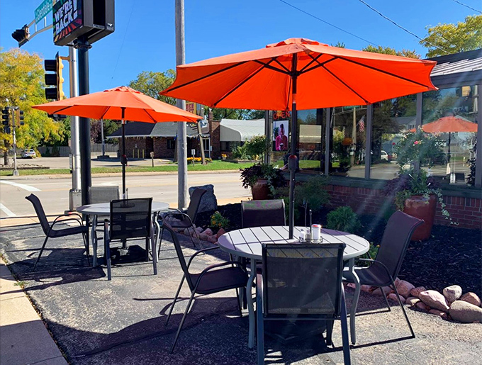 Wisconsin summers are meant for outdoor dining, and these cheerful orange umbrellas provide the perfect spot for people-watching with your pancakes.