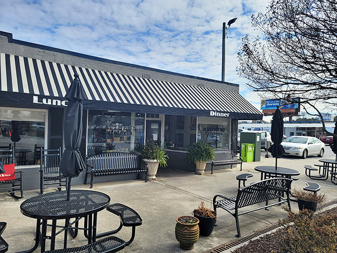 The outdoor seating area offers a moment of reflection before diving into a meal that might require a post-lunch nap.