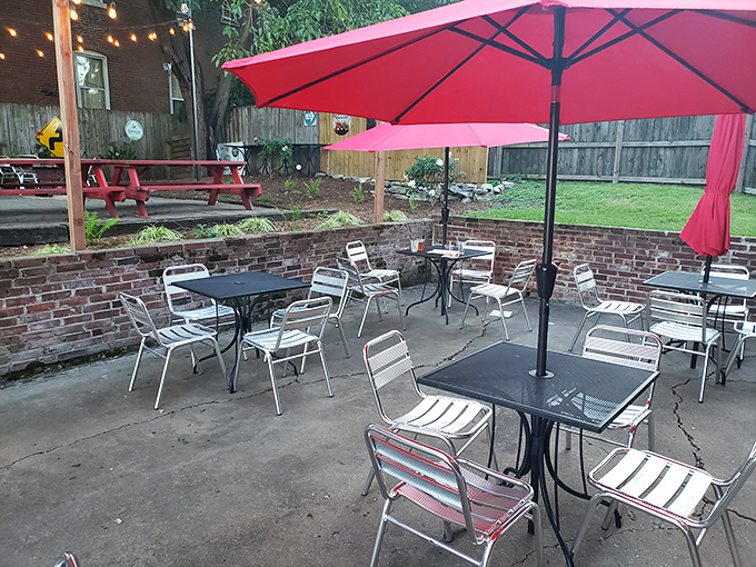 The outdoor patio&mdash;where fresh air and smashburgers come together in a beautiful al fresco romance under cheerful red umbrellas.