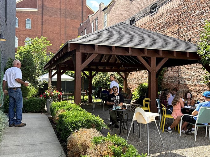 Sunny afternoons under a wooden pavilion offer you a perfect outdoor spot to relax and enjoy good company and food.