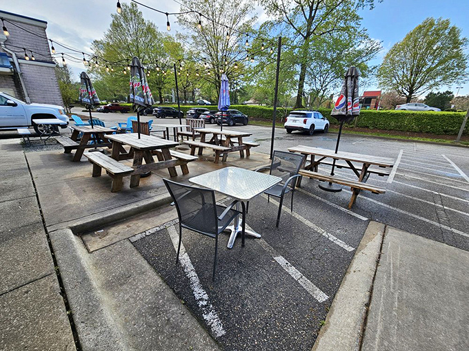 Outdoor dining where the Carolina sky serves as the perfect ceiling for contemplating the meaning of perfect barbecue.