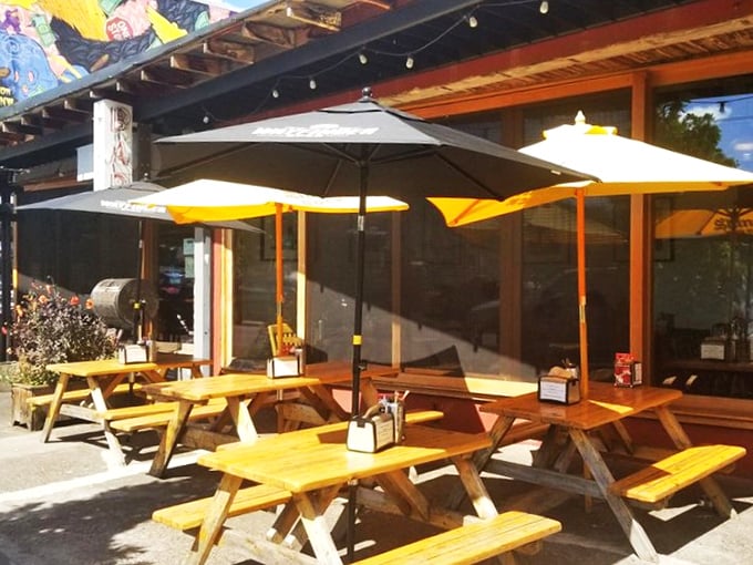 Outdoor picnic tables bathed in Portland sunshine &ndash; a rare and beautiful sight, much like finding authentic Texas barbecue this far from the Lone Star State.