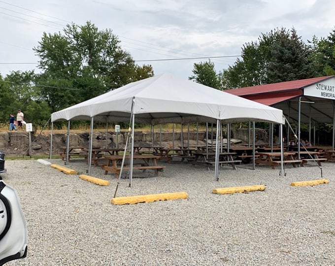 Outdoor seating under a tent&mdash;because sometimes you need fresh air to fully appreciate the simple perfection of comfort food.