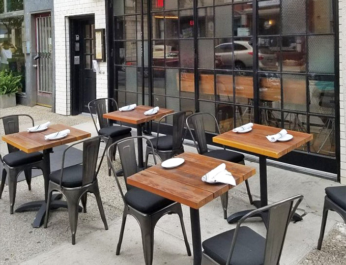 Sidewalk seating for those who prefer their meat feasts with a side of people-watching and Philadelphia's vibrant street energy.