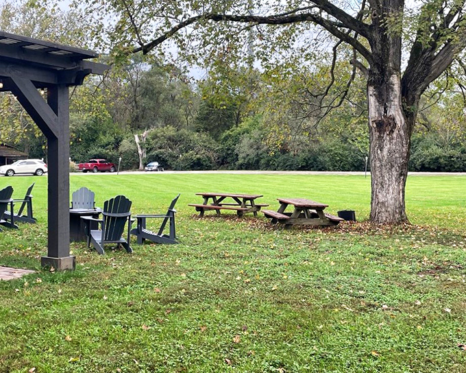 The outdoor seating area offers a pastoral escape. After that meal, you might need those Adirondack chairs for a strategic recovery nap.