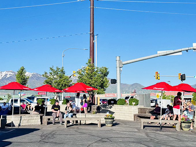 The outdoor dining area where strangers become friends, united by the universal language of "mmm" and "pass the napkins, please."