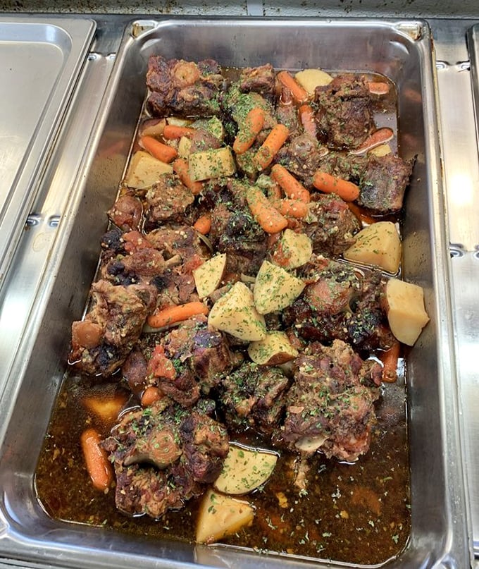 Oxtails swimming with potatoes and carrots in a rich gravy&mdash;proof that the most humble cuts often deliver the most magnificent flavors.