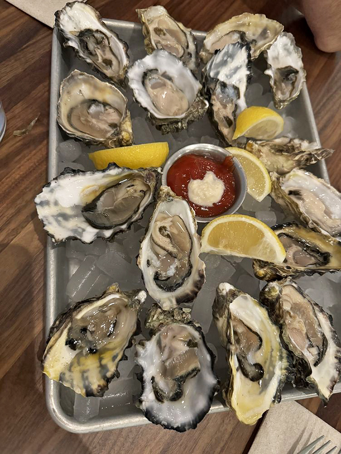 Oysters arranged like a clock of oceanic delights, with lemon wedges standing by to brighten each slurp. Time stops when you're enjoying these.