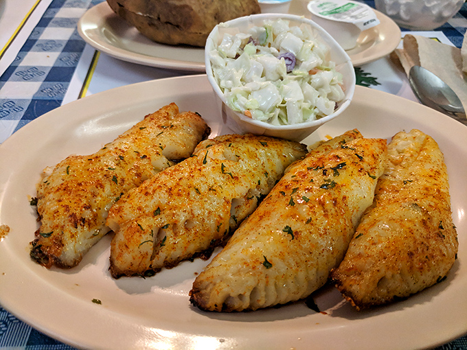 Broiled fish fillets that prove not everything delicious at a fish camp needs a bath in the fryer.
