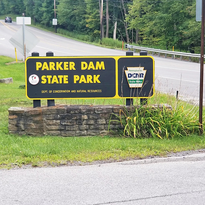 The entrance sign promises adventure&mdash;Parker Dam's stone foundation has been welcoming nature lovers since before "selfie spots" were a thing.