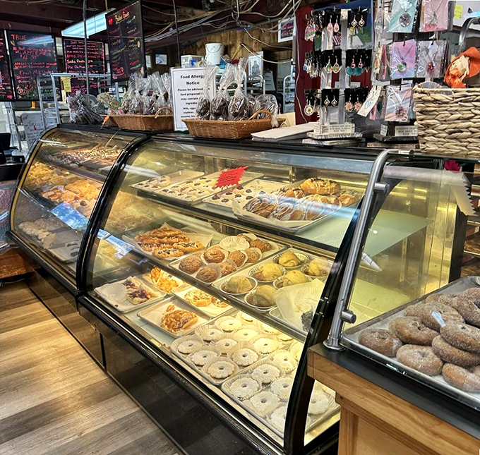 The display case: where willpower goes to die. Each pastry seems to whisper, "Diet? What diet? We both know you're taking me home."
